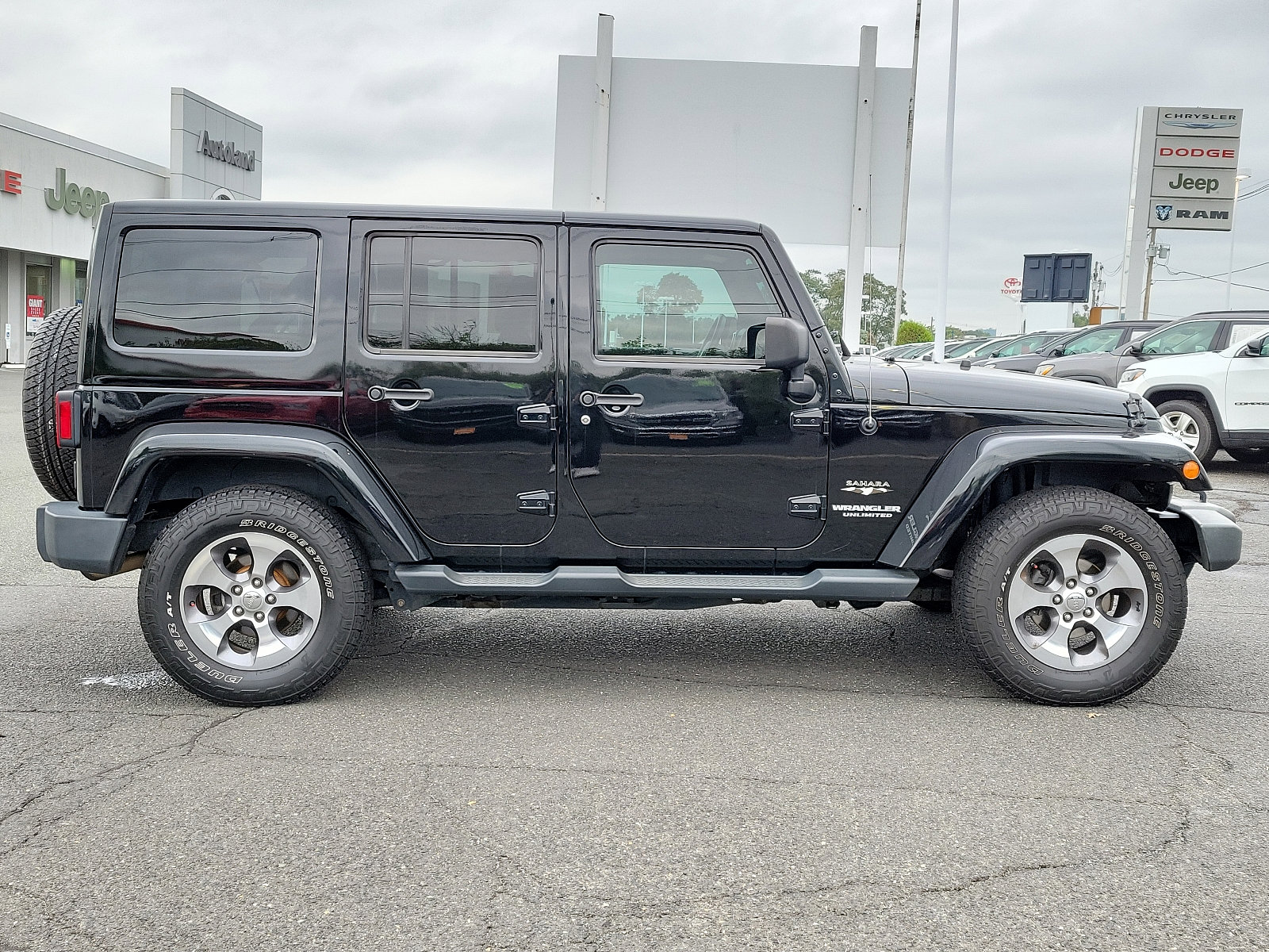 Pre-Owned 2016 Jeep Wrangler Unlimited Sahara Convertible in ...