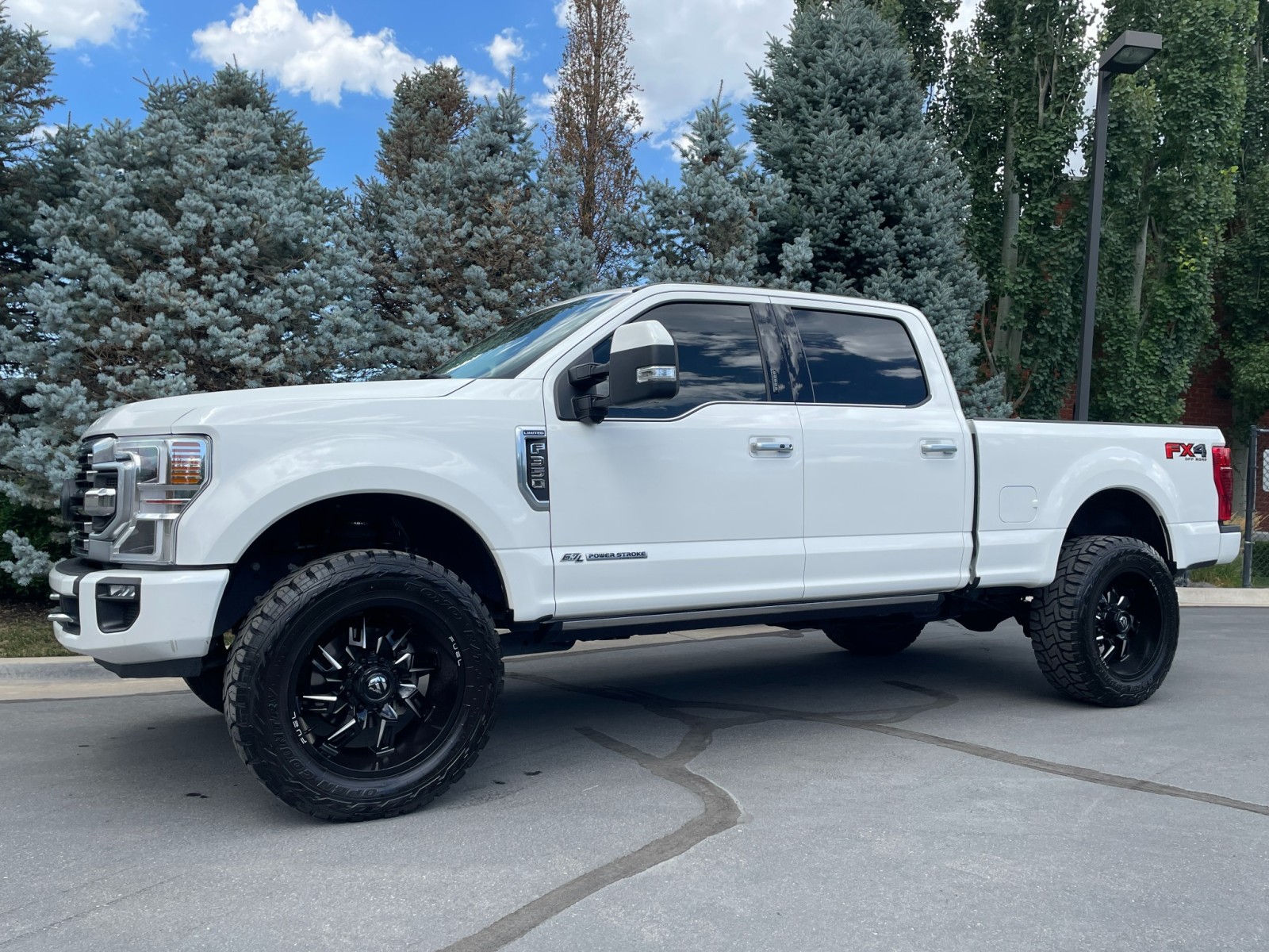 White Ford Super Duty Lifted