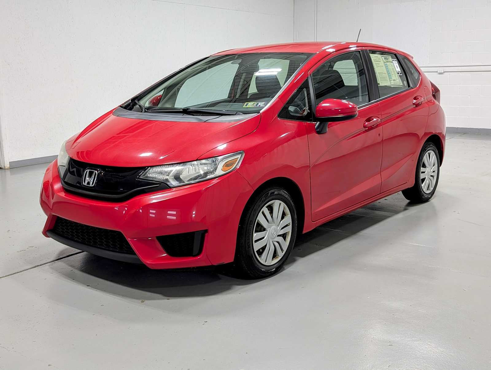 Pre-Owned 2016 Honda Fit LX in Milano Red | Greensburg, PA | #H84532X
