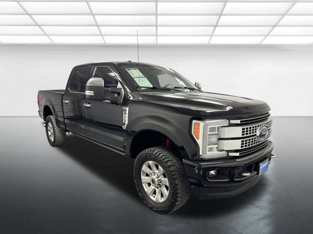 Pre-Owned 2017 Ford Super Duty F-250 SRW Lariat Crew Pickup in Orange #D40979A | Granger Chevrolet