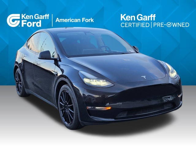 Tesla model y certified pre owned store