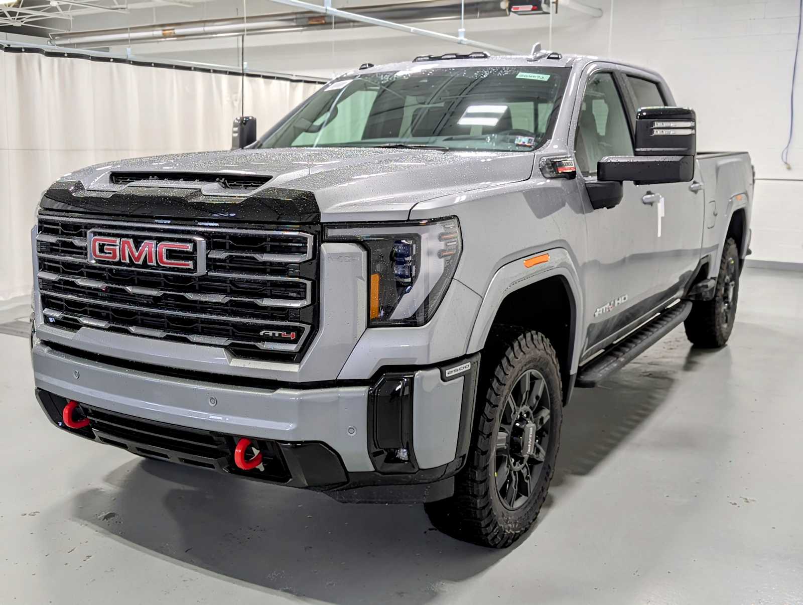 New 2025 GMC Sierra 2500HD AT4 Crew Cab Pickup in Sterling Metallic ...