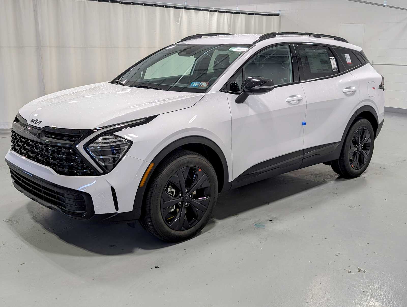 New 2025 Kia Sportage X-Line in GLACIAL WHITE P | Greensburg, PA | #K06775
