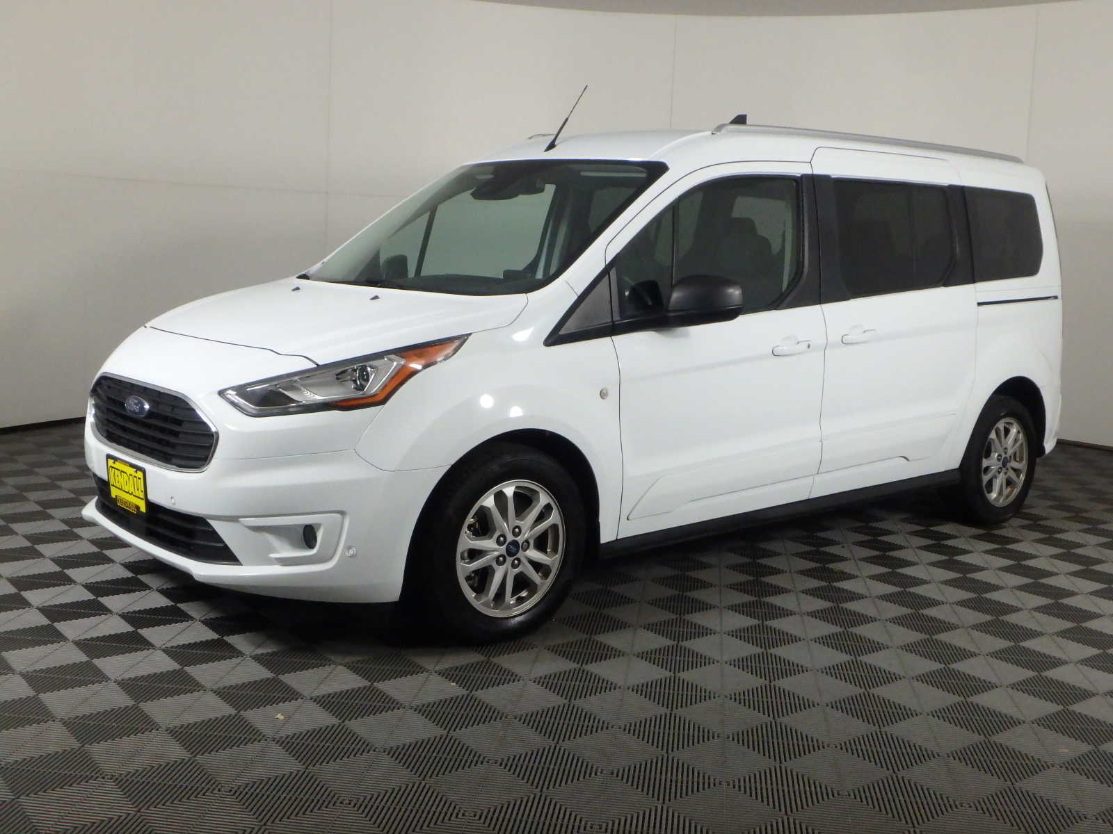 White Ford Passenger Van