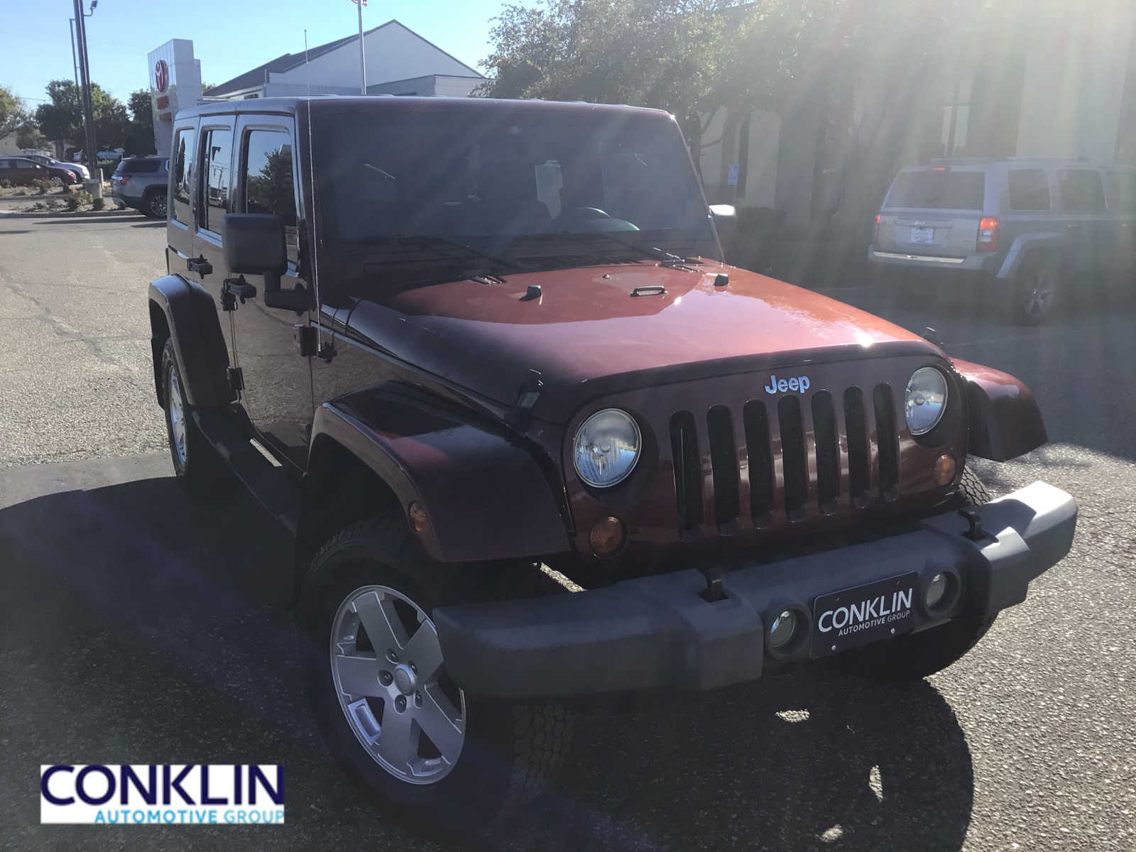 Maroon Jeep Wrangler Unlimited