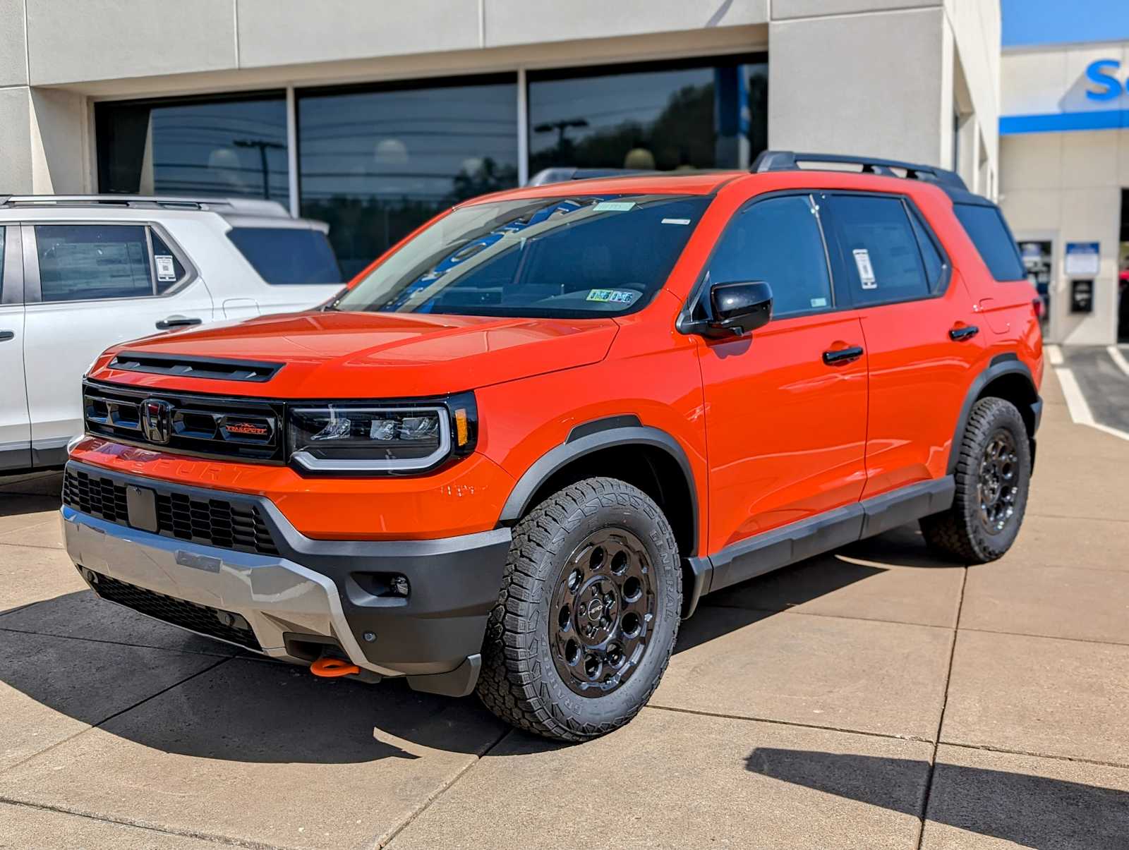 New 2026 Honda Passport TrailSport Elite Blackout in Sunset Orange ...