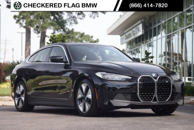 New 2024 BMW i4 xDrive40 4D Hatchback in #B69434 | Checkered Flag